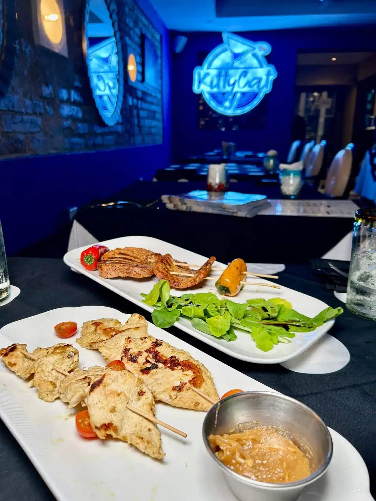 Sip and Savor at the Intimate Bar of Kitty Cat